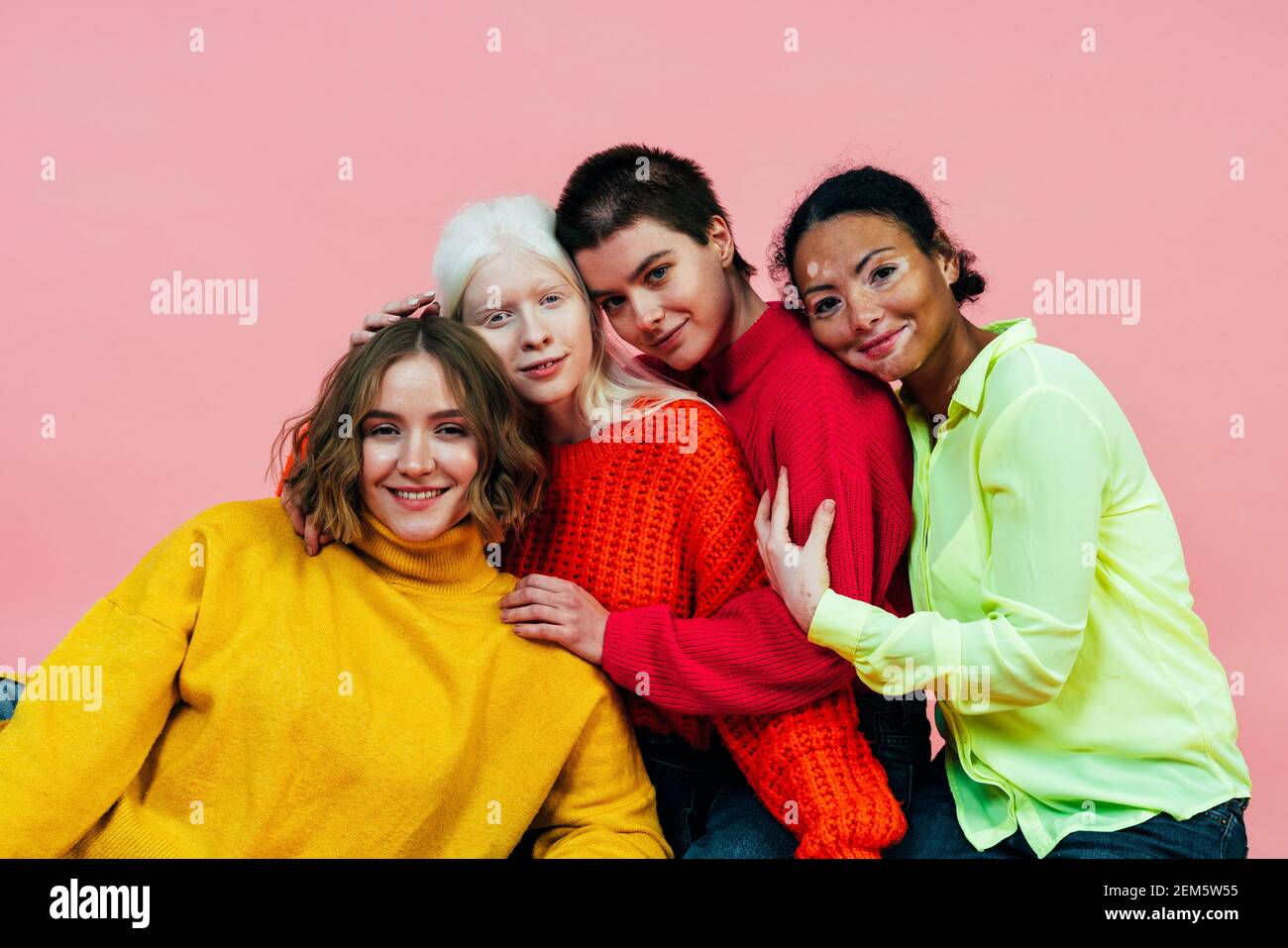 group of multiethnic women with different kind of skin posing together ...