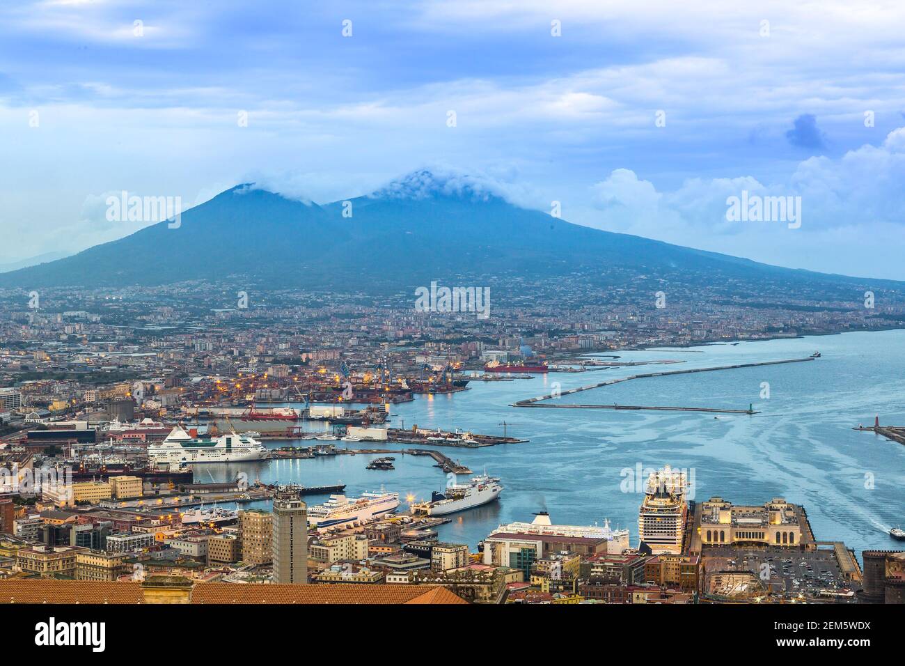 Napoli (Naples) and mount Vesuvius in the background at sunset in a ...
