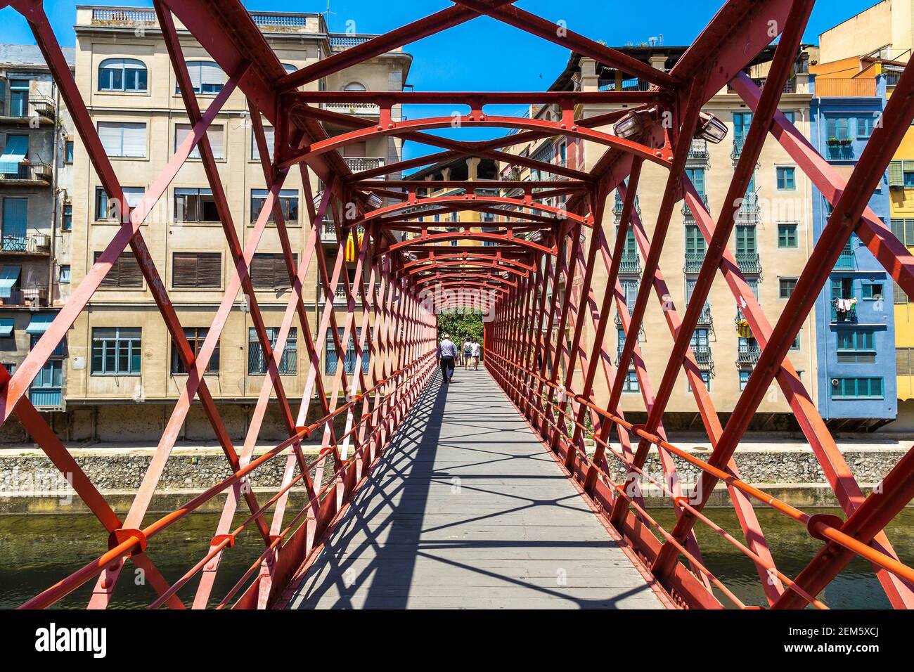 Red iron bridge - Eiffel bridge in Girona, in a beautiful summer day ...