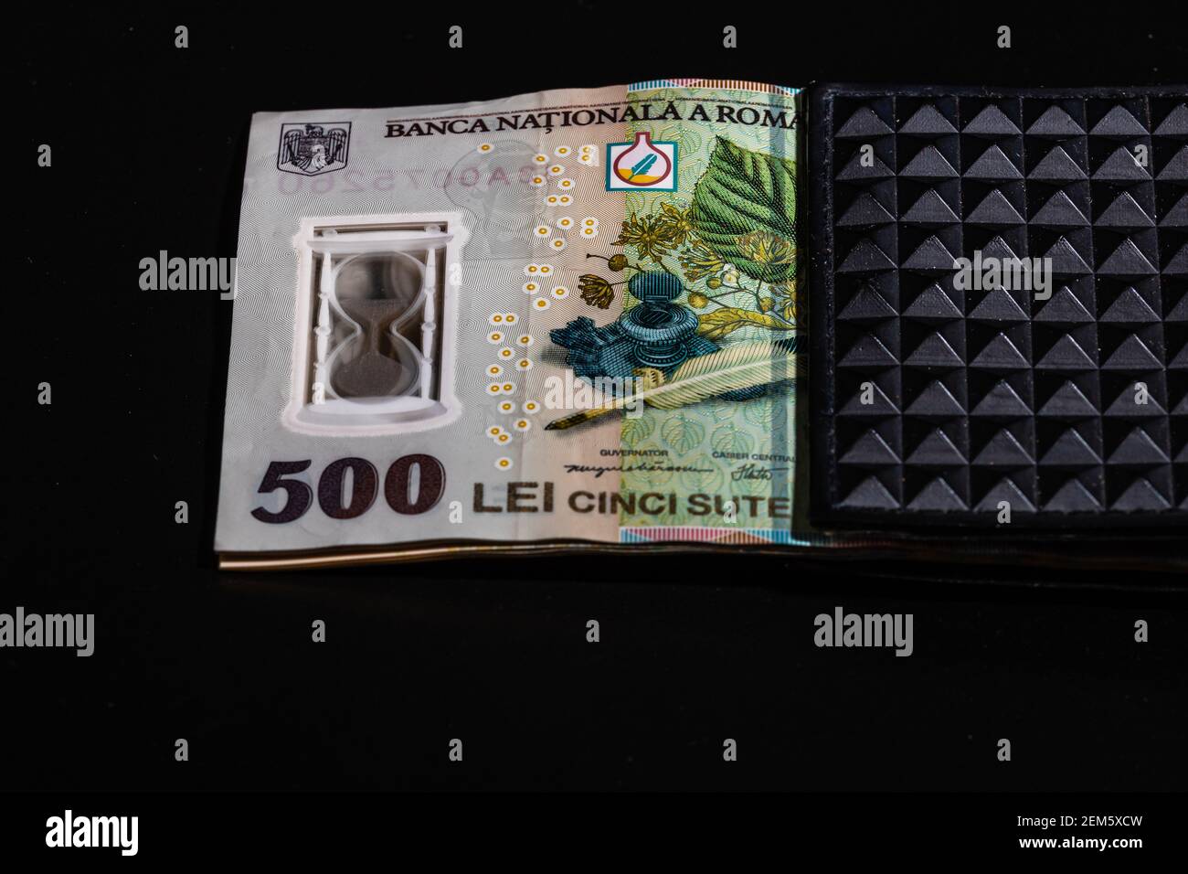 LEI romanian money banknotes in black wallet isolated Stock Photo - Alamy