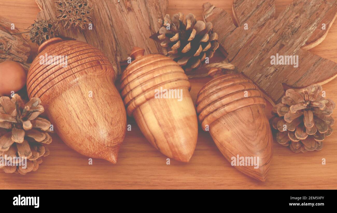 Interior decoration three Wooden olive tree acorns Stock Photo - Alamy