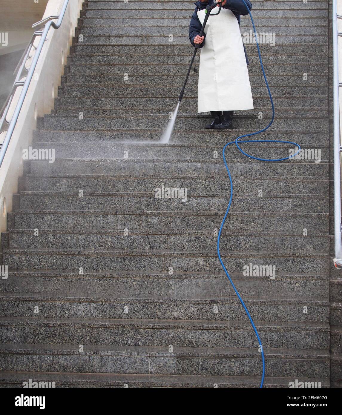 City workers - cleaning and washing of city streets Stock Photo - Alamy