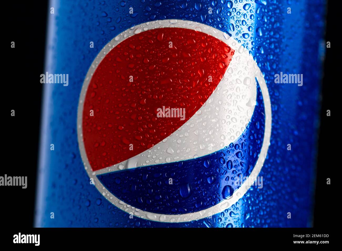 Detail of classic Pepsi can with water droplets on black background ...