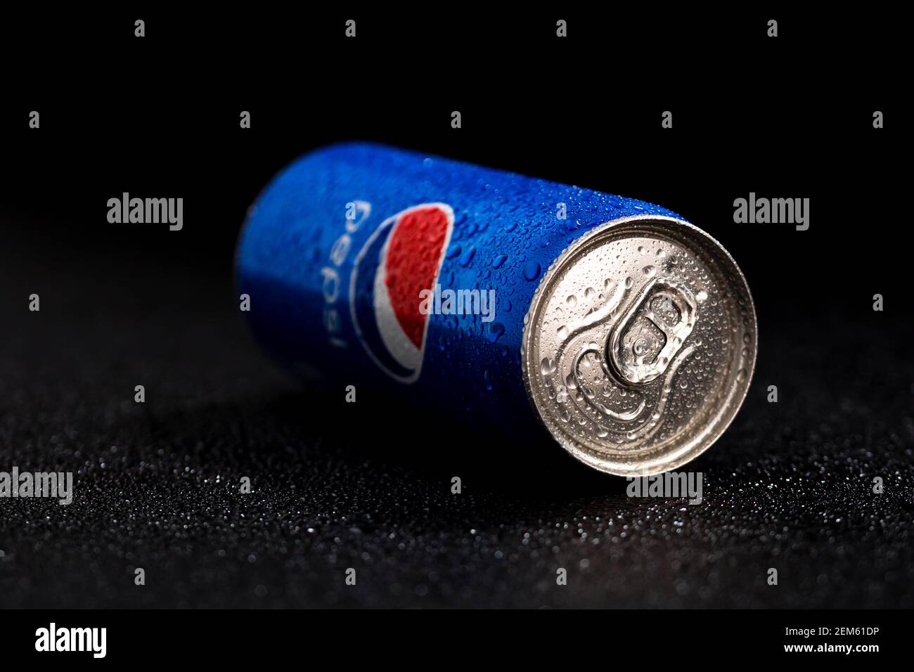 Editorial photo of Pepsi can with water droplets on black background ...