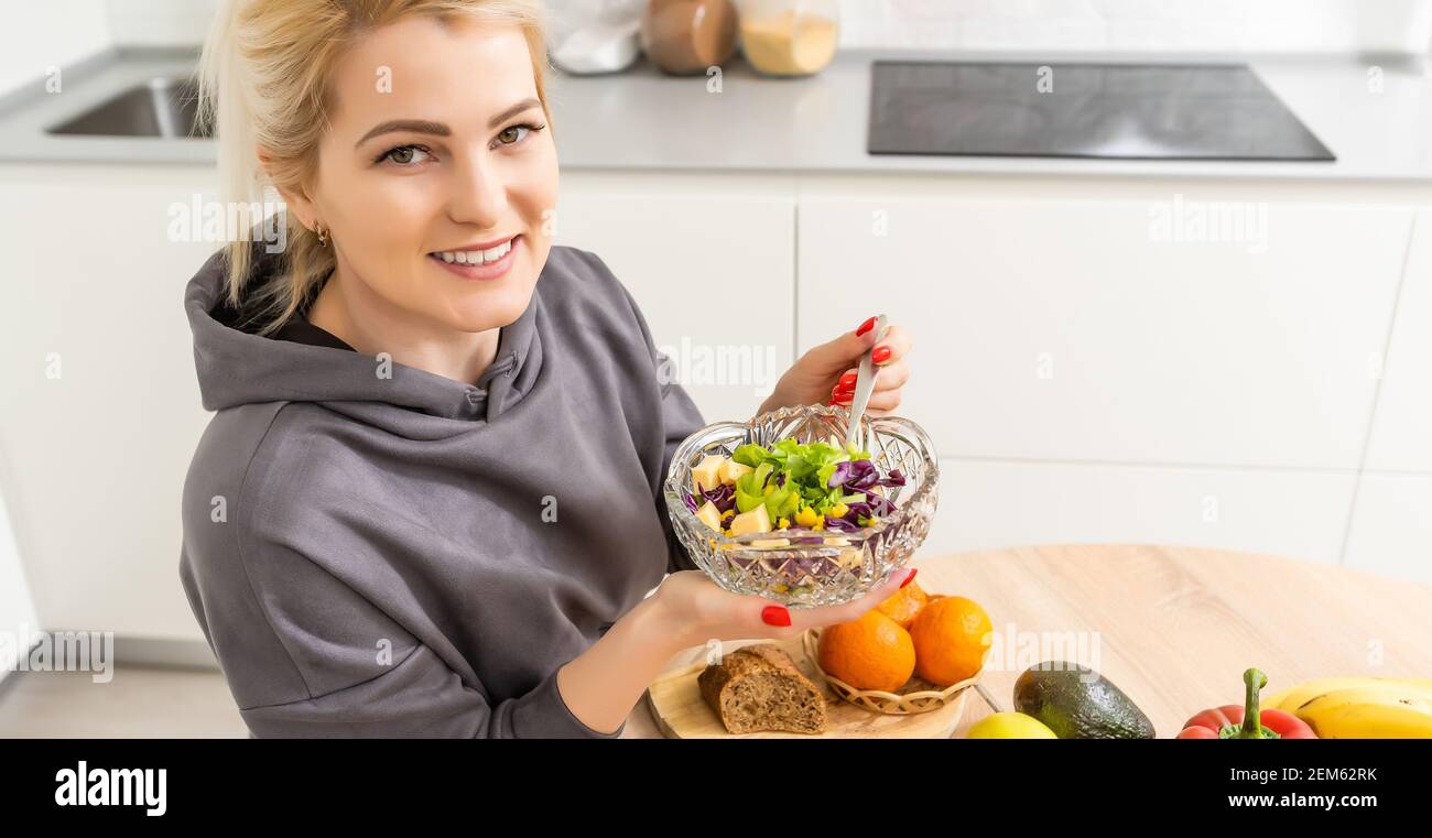 Healthy food. Woman preparing fruits and vegetables Stock Photo - Alamy