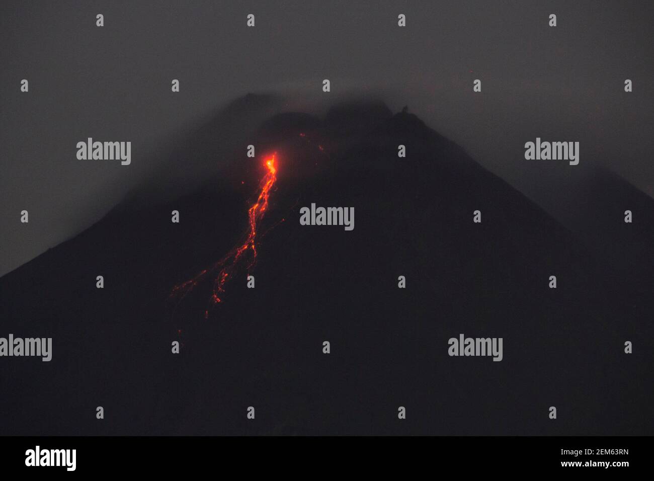 Sleman, Yogyakarta, Indonesia. 24th Feb, 2021. Mount Merapi emits ...
