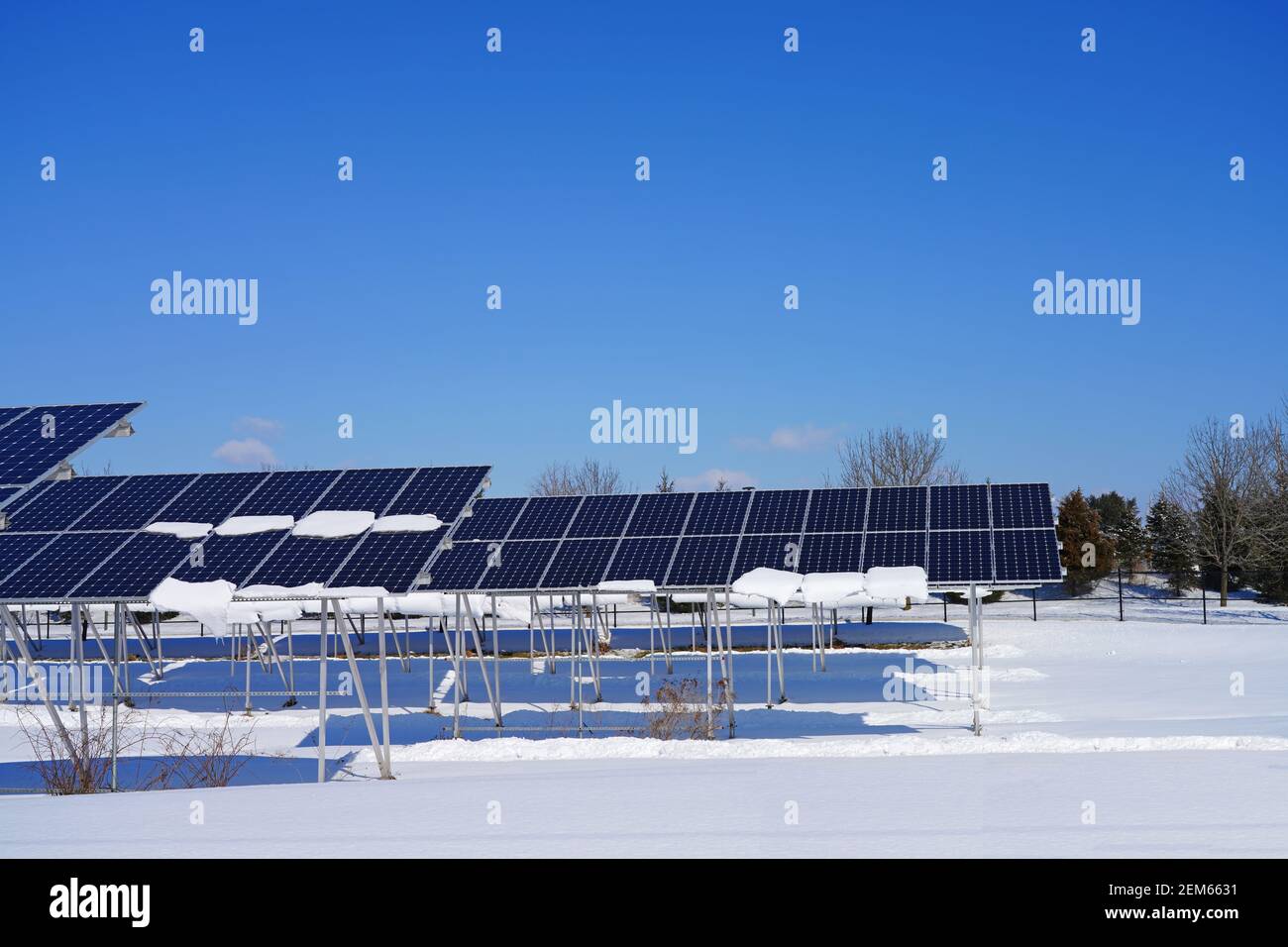 SKILLMAN, NJ -20 FEB 2021- View of solar panels covered with snow at a ...