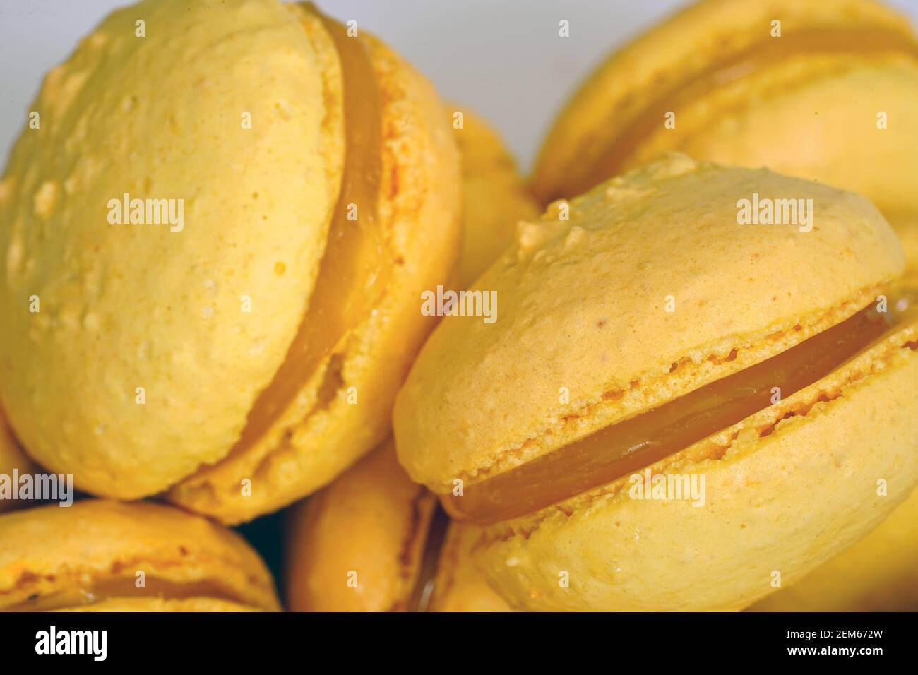 Homemade lemon macaron cookies filled with lemon curd Stock Photo - Alamy
