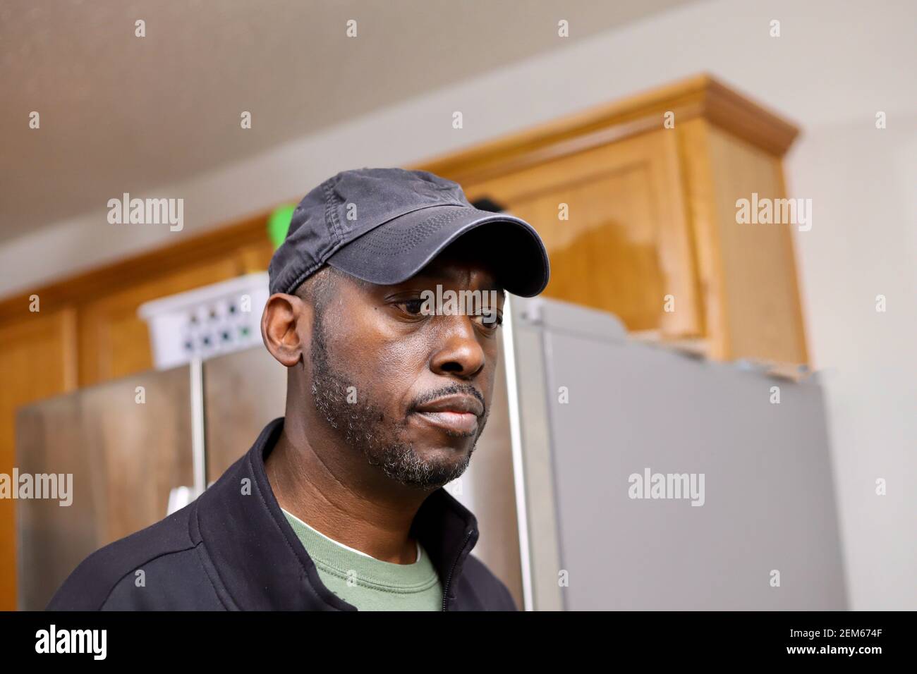 A portrait of a African-American man looking sad and lonely Stock Photo ...