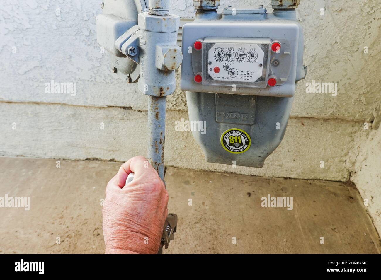 Residential home gas meter with wrench USA Stock Photo - Alamy