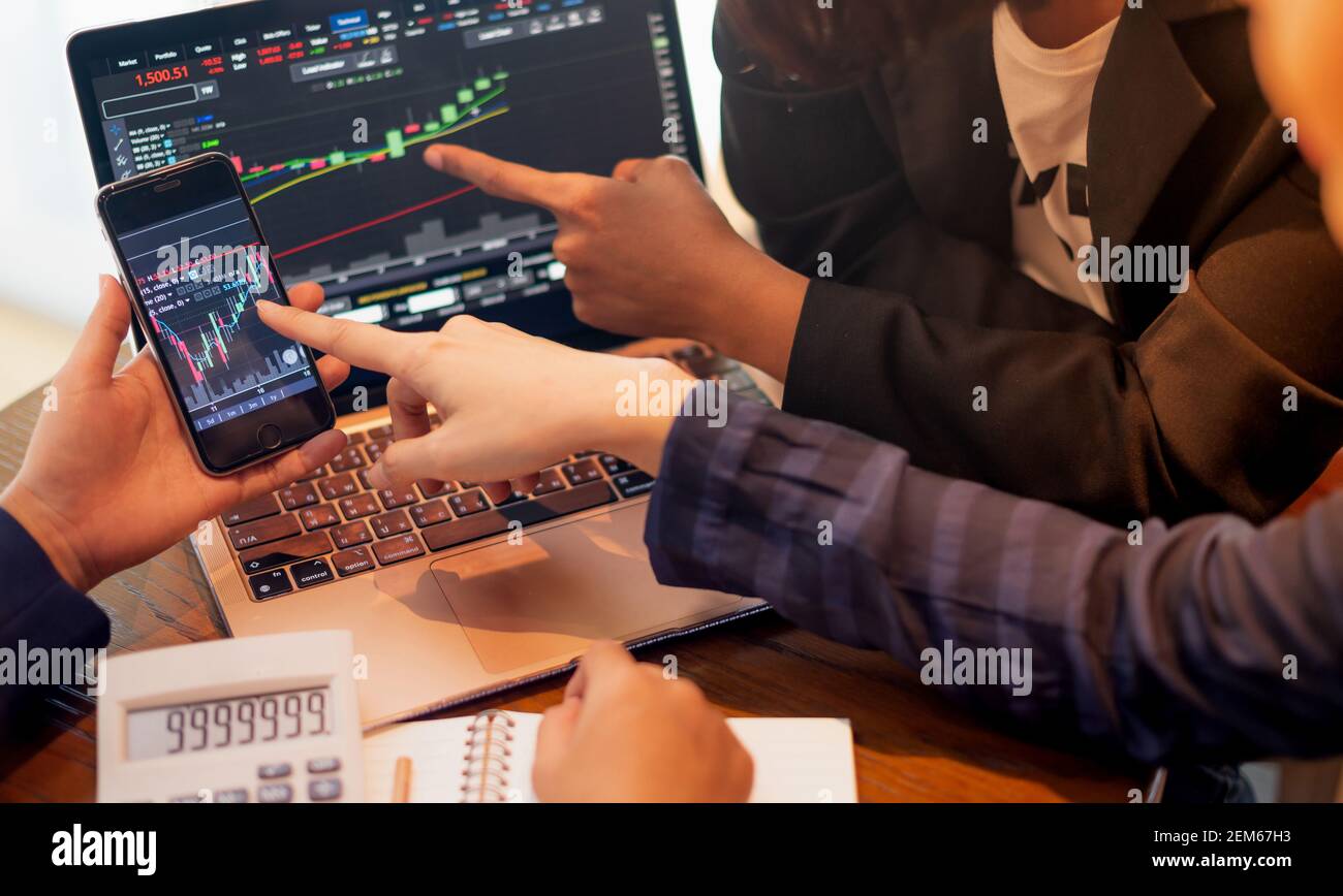 Group investment brokers hi-res stock photography and images - Alamy