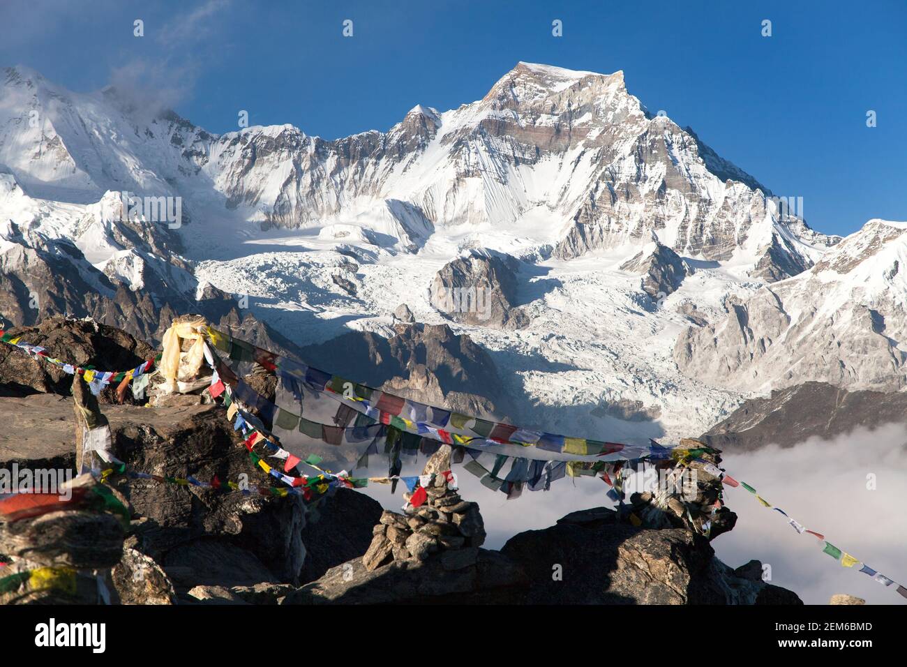 Panoramic view of mount Cho Oyu and mount Gyachung Kang with prayer ...