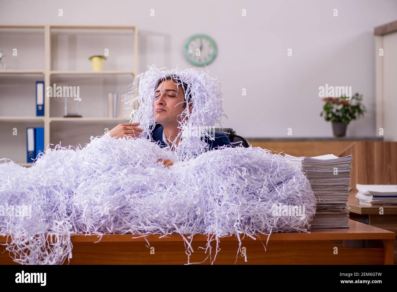 Paper shredder employee hi-res stock photography and images - Alamy