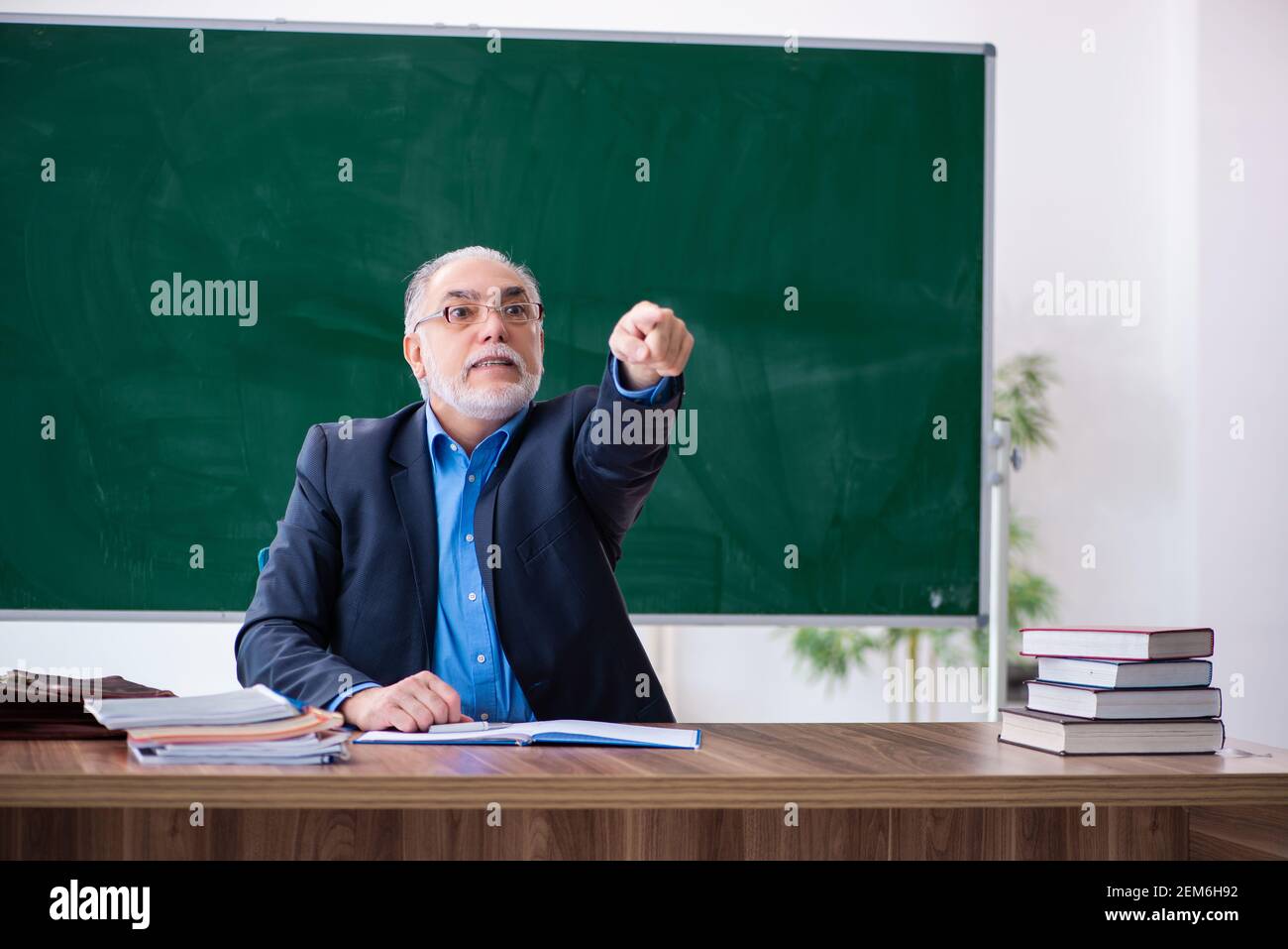 Elderly math teacher hi-res stock photography and images - Alamy