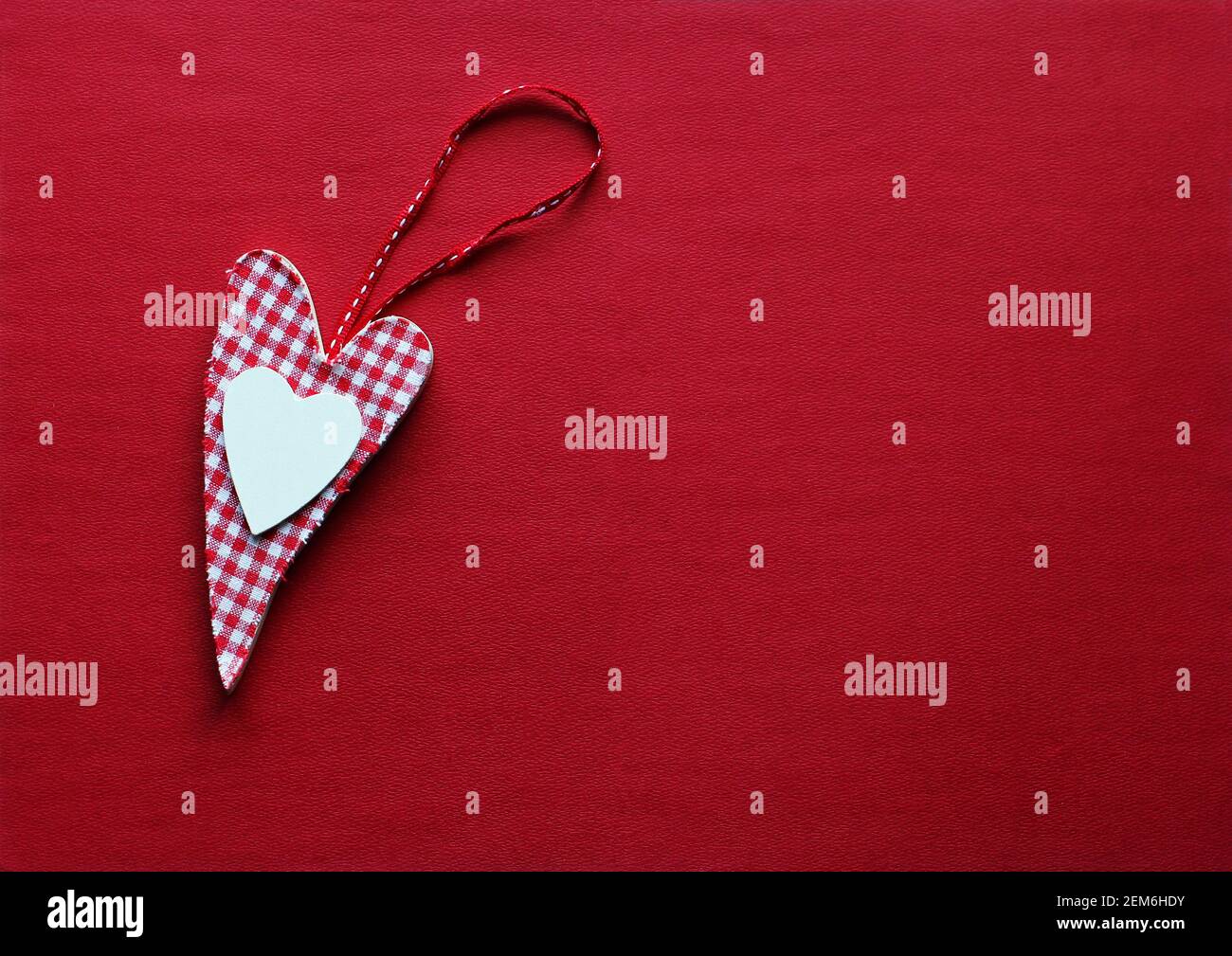 A red and white checkered heart on a red background Stock Photo - Alamy