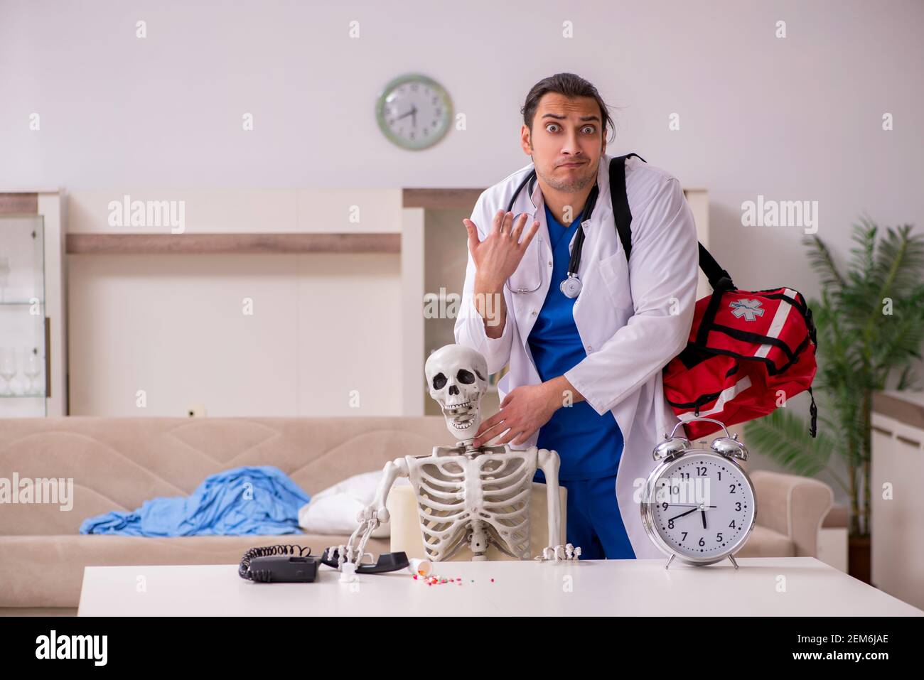 Male paramedic visiting skeleton patient Stock Photo - Alamy