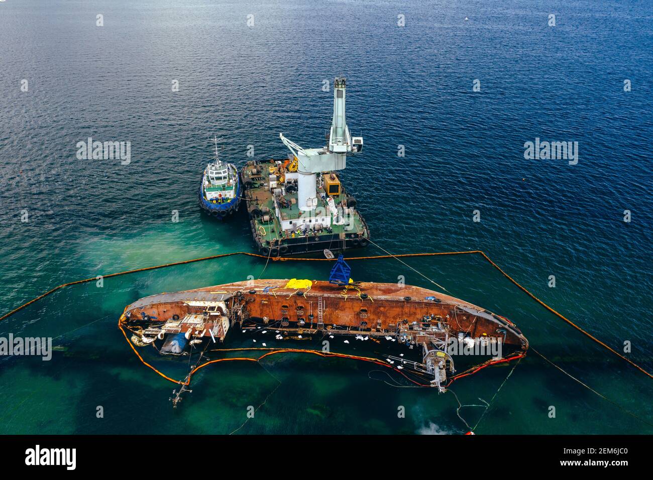 Top view of an old tanker that ran aground and overturned Stock Photo ...