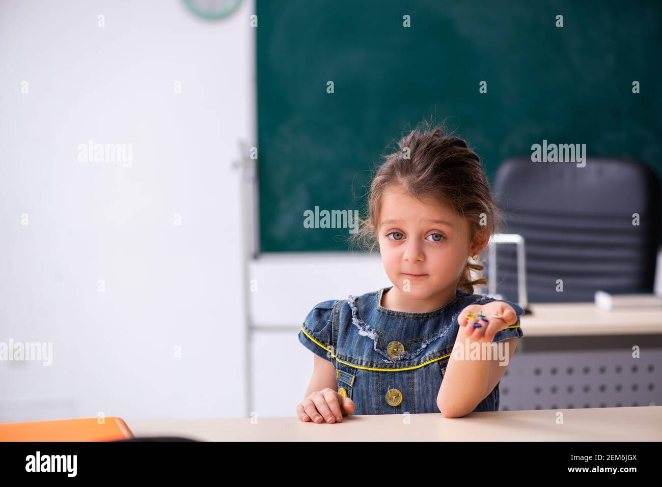 School prank with sharp thumbtacks on chair Stock Photo - Alamy