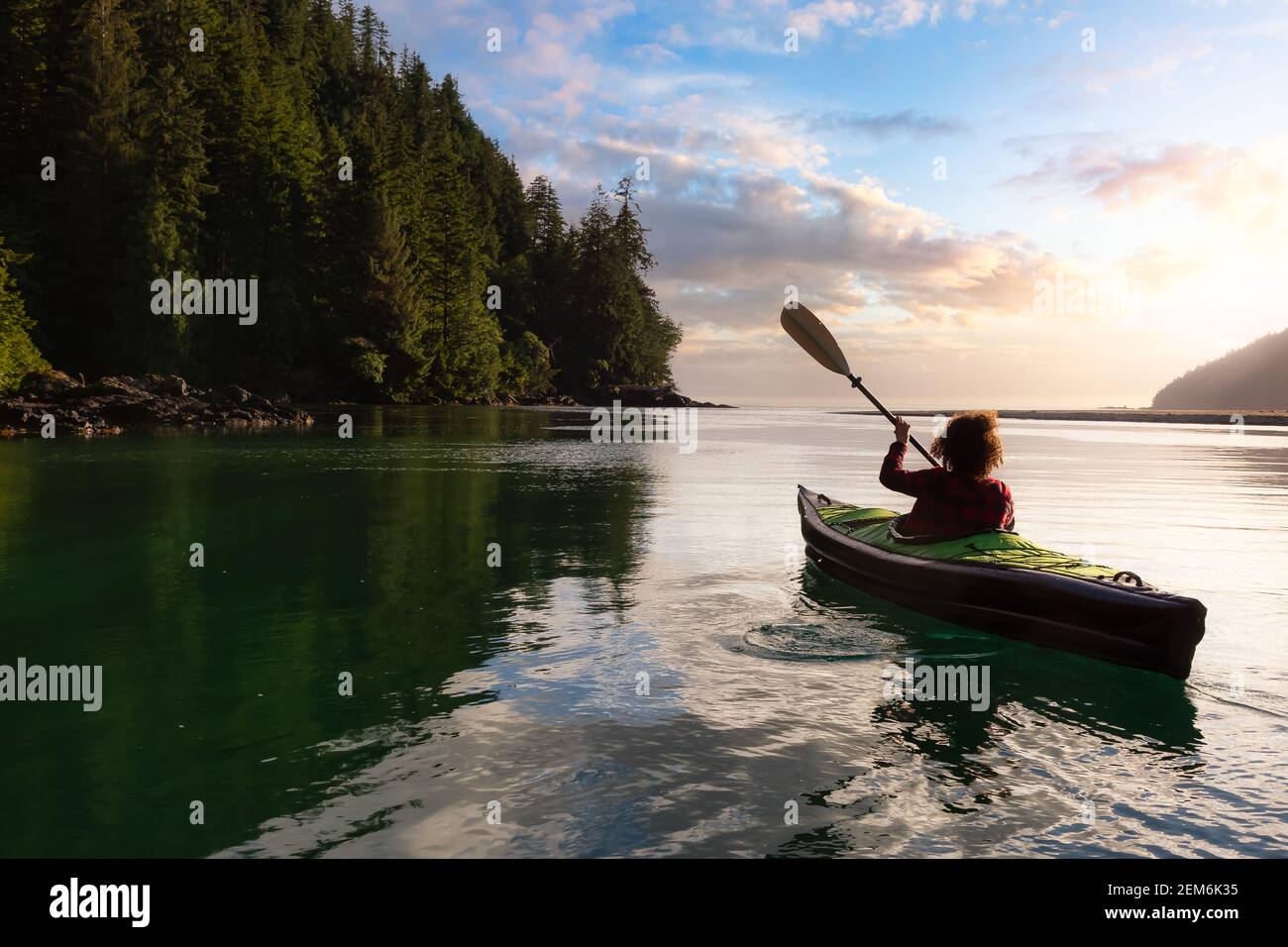 Adventurous Girl kayaking in the Pacific Ocean Stock Photo - Alamy