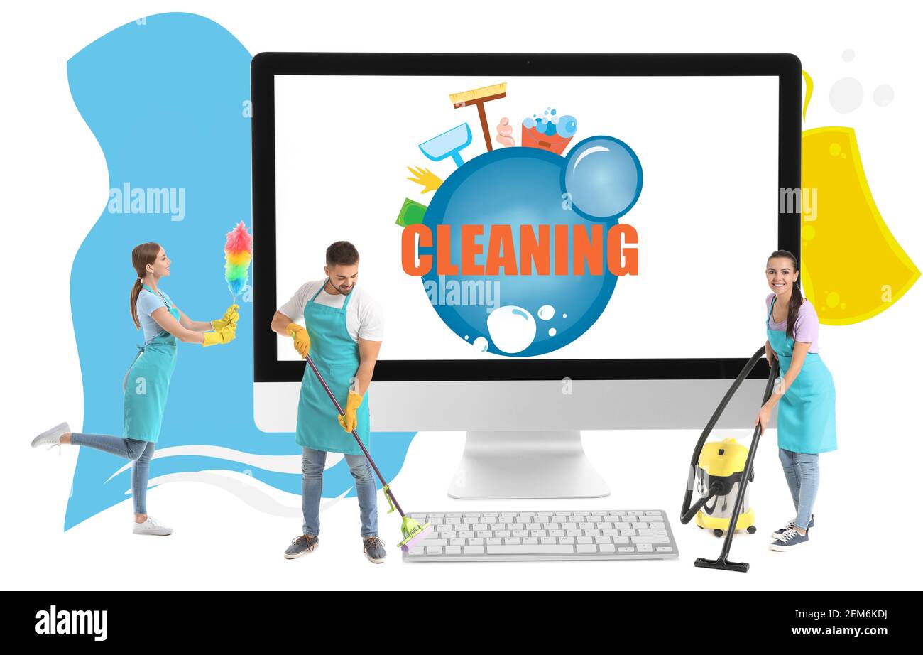 Small janitors and modern computer on white background Stock Photo - Alamy