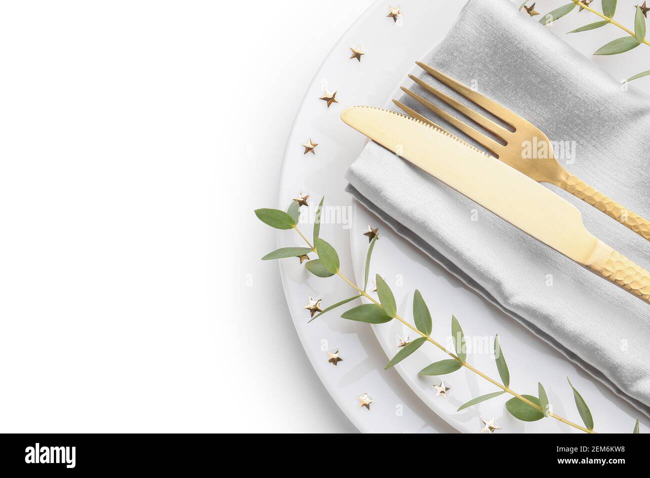Beautiful table setting on white background Stock Photo - Alamy