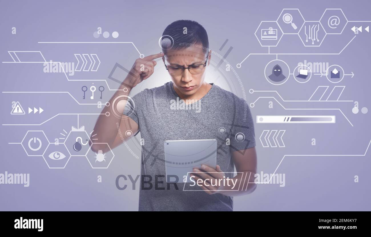 Male Asian programmer with tablet computer creating software for data ...