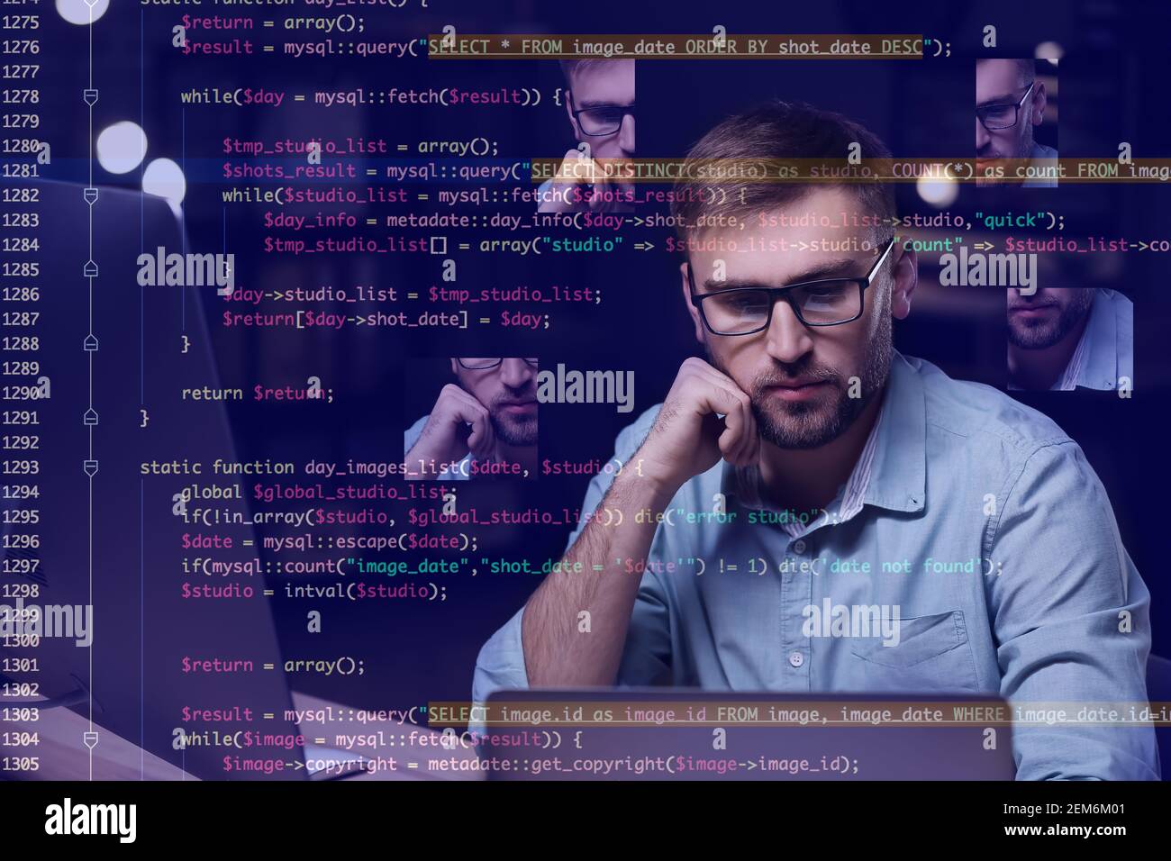 Male programmer working in office at night Stock Photo - Alamy