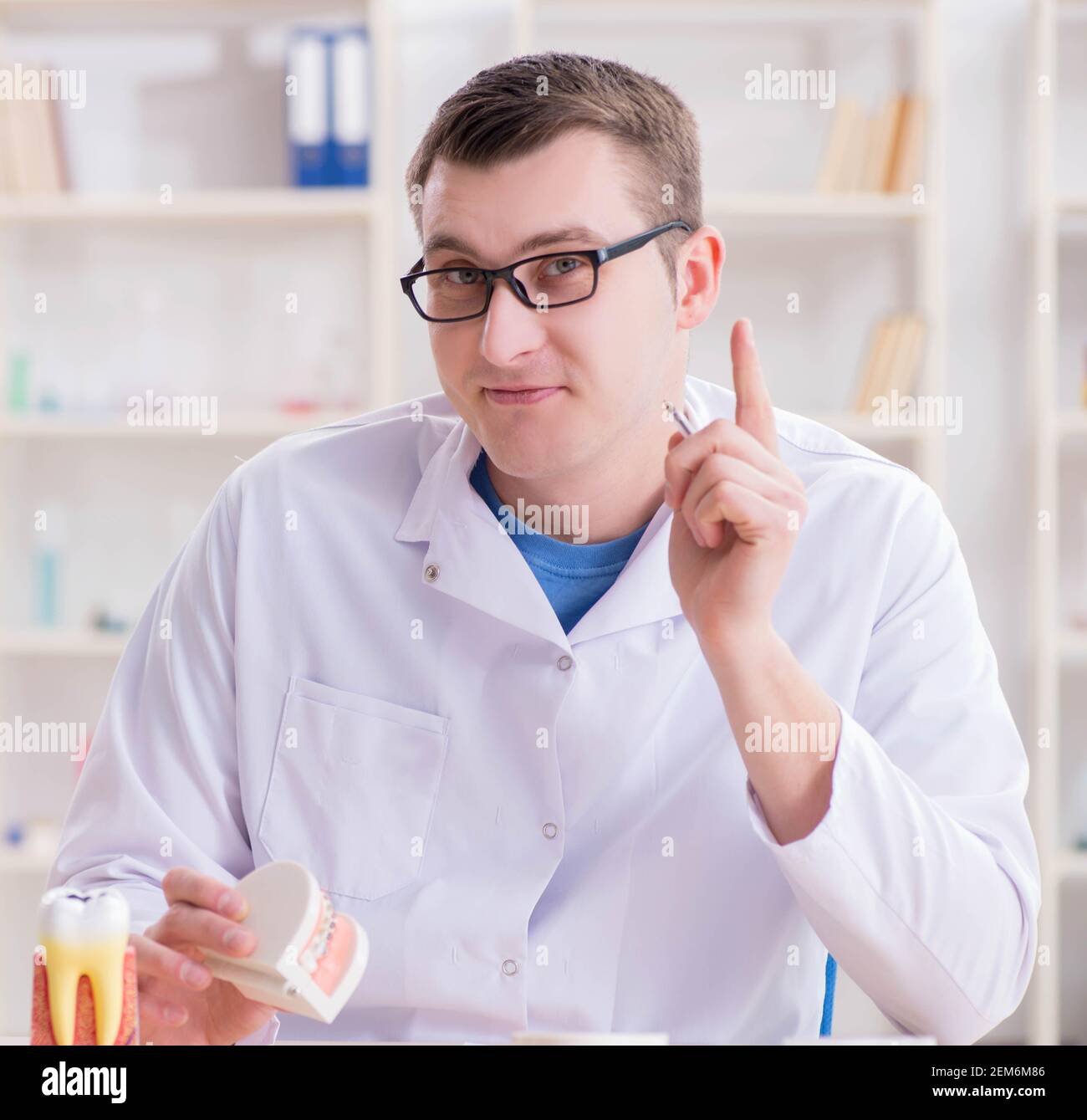 The dentist working teeth implant in medical lab Stock Photo - Alamy