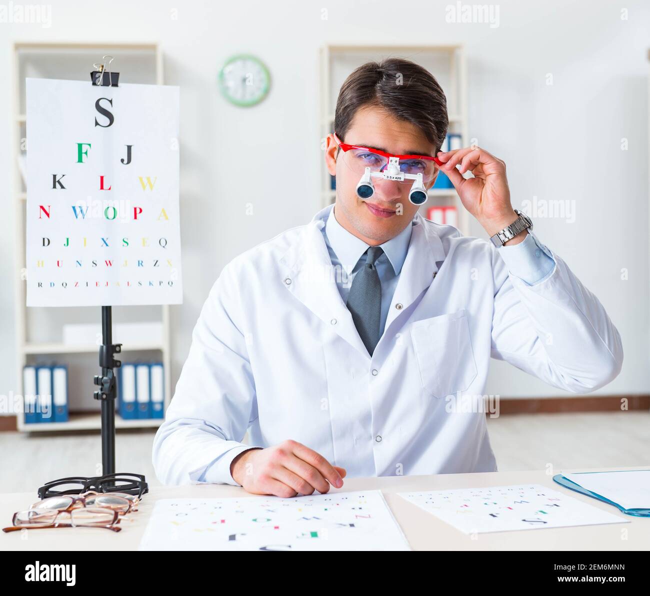 The eye doctor in eyecare concept in hospital Stock Photo - Alamy
