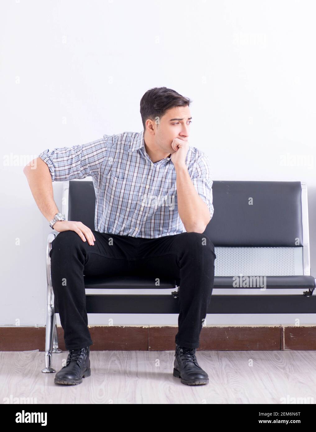 The man nervously impatiently waiting in the lobby Stock Photo - Alamy