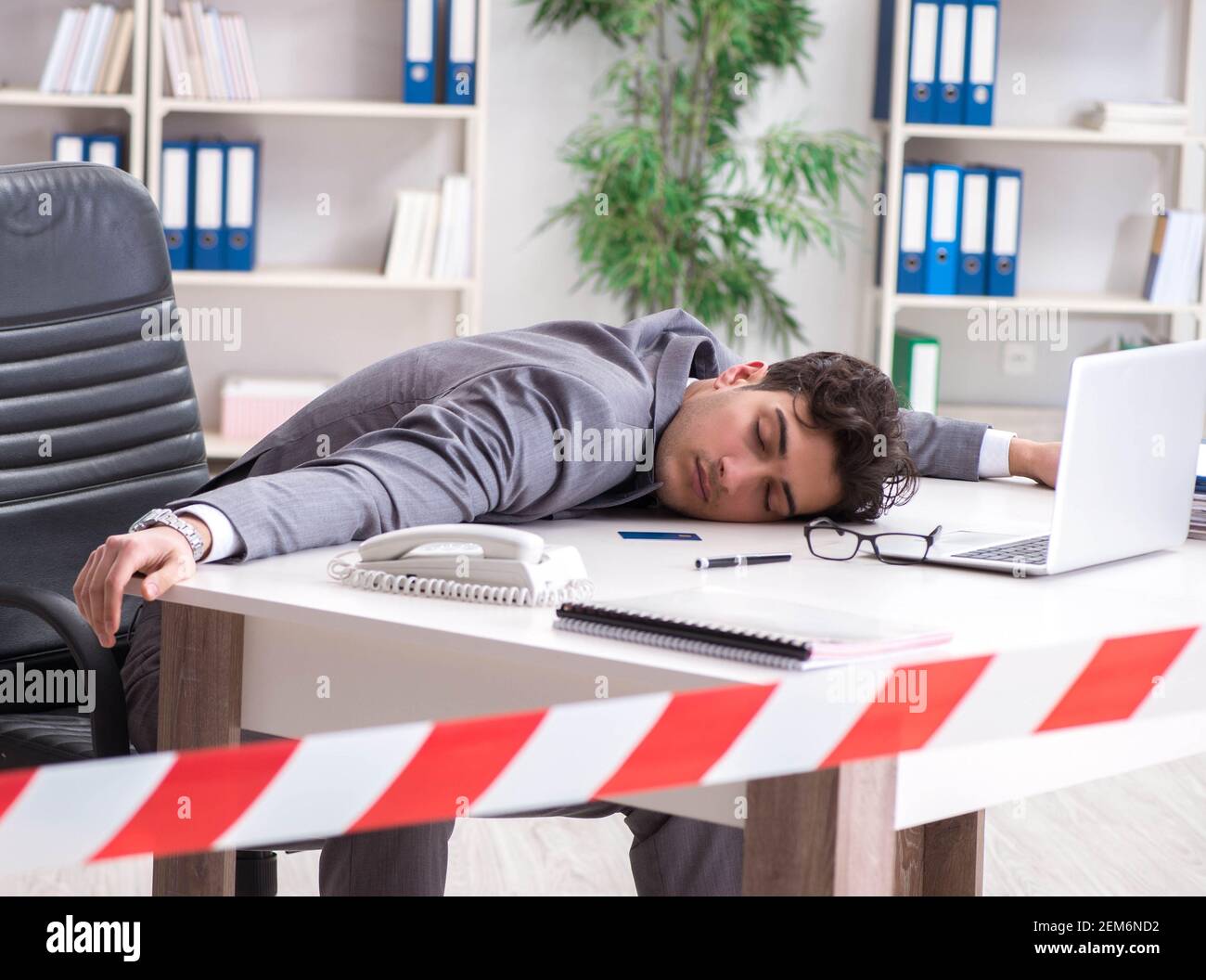 Man sleeping under desk hi-res stock photography and images - Alamy
