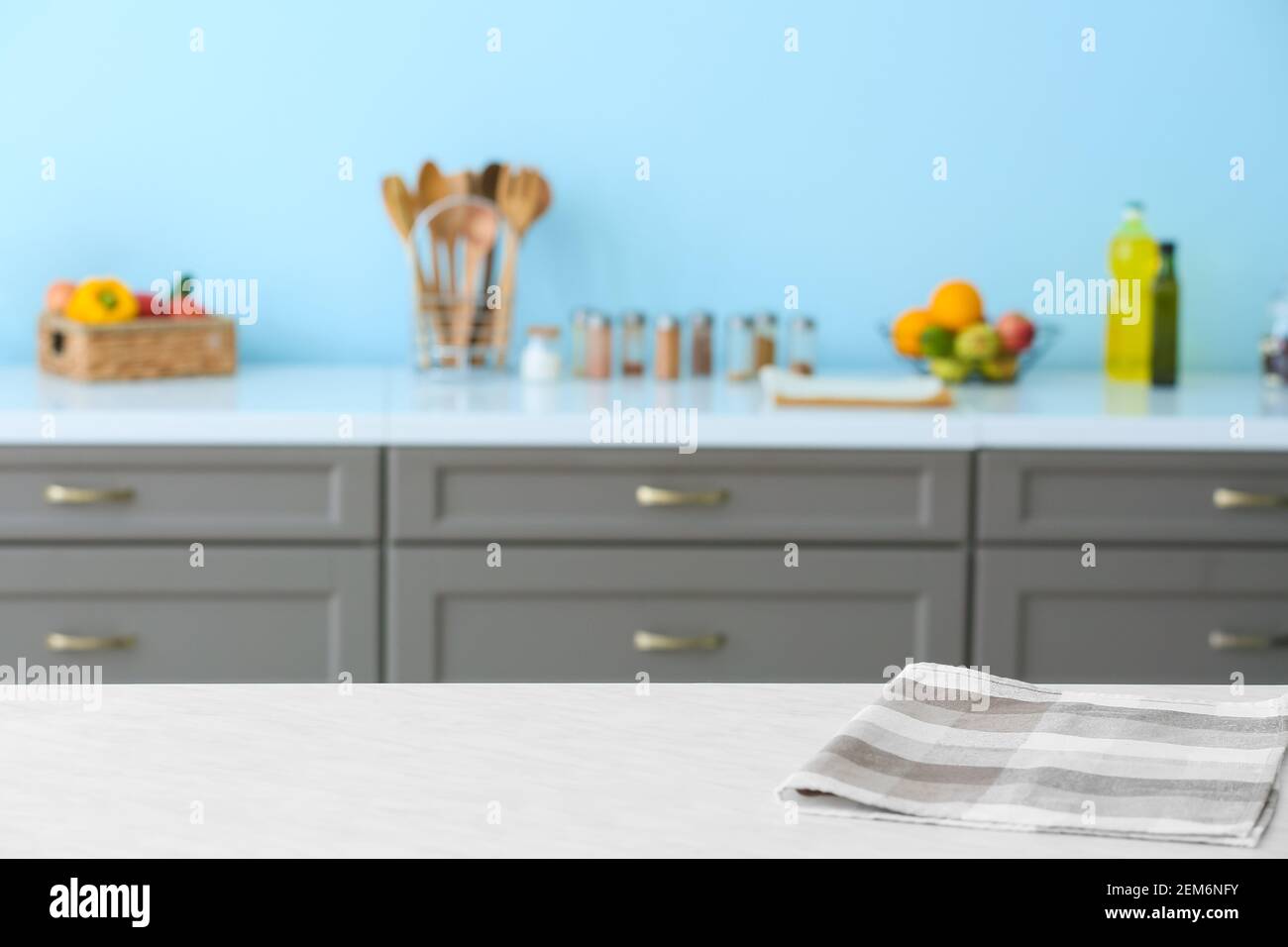 Clean napkin on table in modern kitchen Stock Photo - Alamy