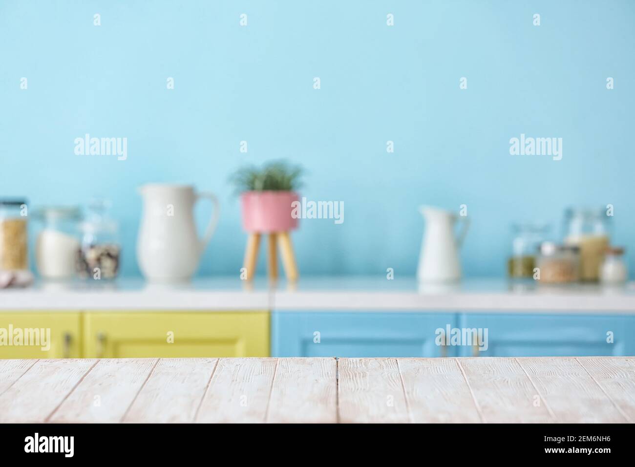 Empty table in modern kitchen Stock Photo - Alamy