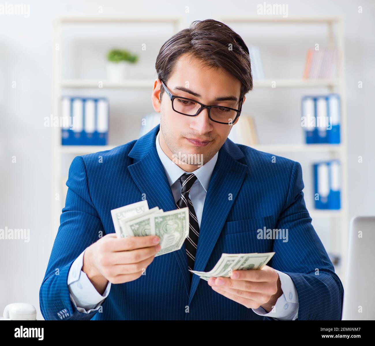 The businessman receiving his salary and bonus Stock Photo - Alamy