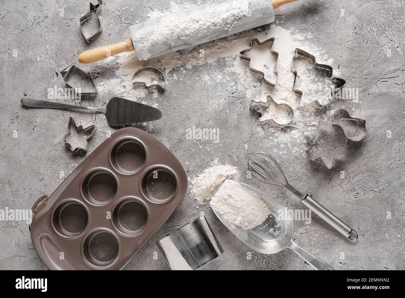 Frame made of kitchen utensils for preparing bakery and flour on dark ...