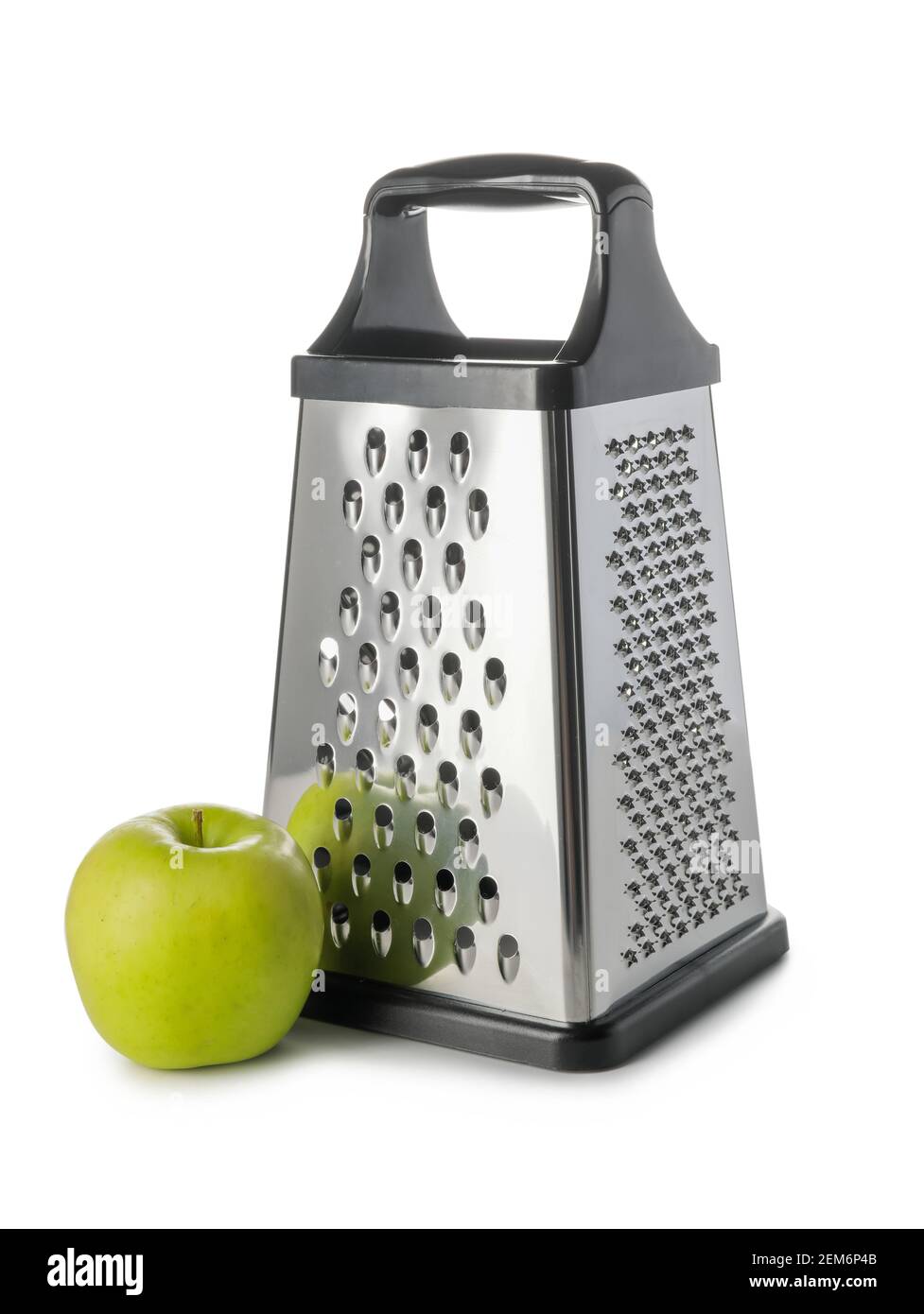 Metal grater and apple on white background Stock Photo - Alamy