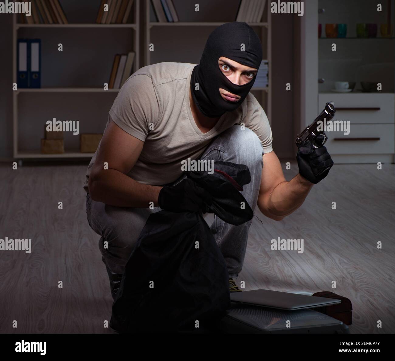 The burglar wearing balaclava mask at crime scene Stock Photo - Alamy