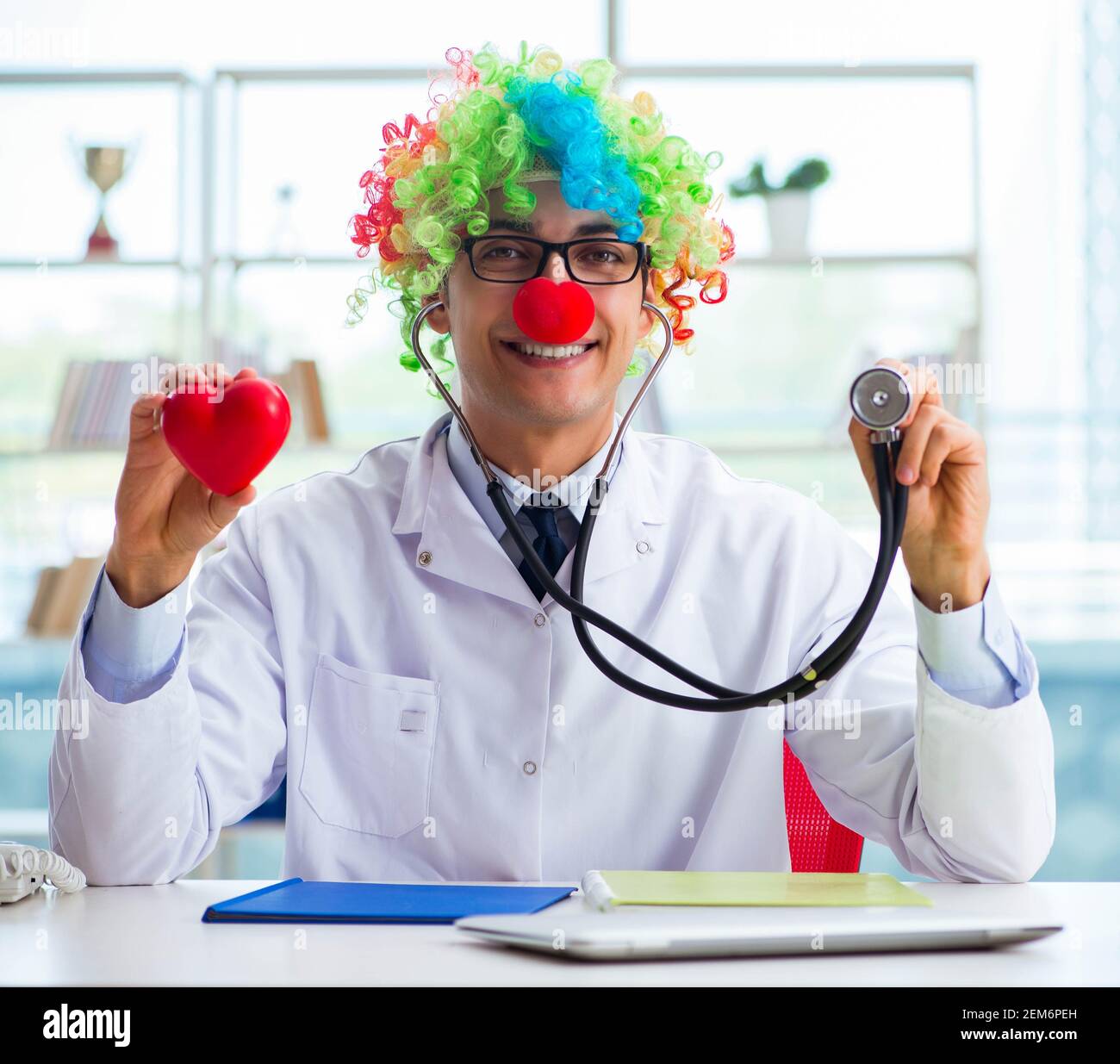 The child cardiologist with stethoscope and red heart Stock Photo - Alamy