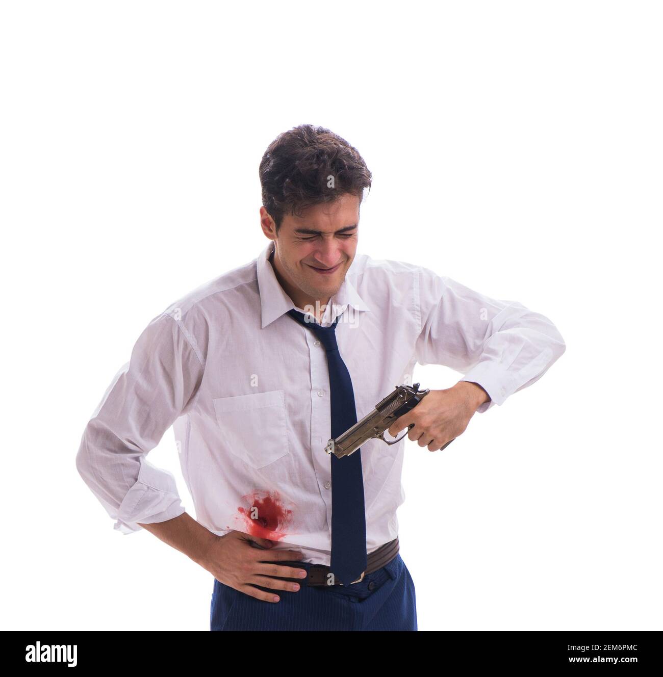 The businessman wounded in gun fight isolated on white Stock Photo - Alamy