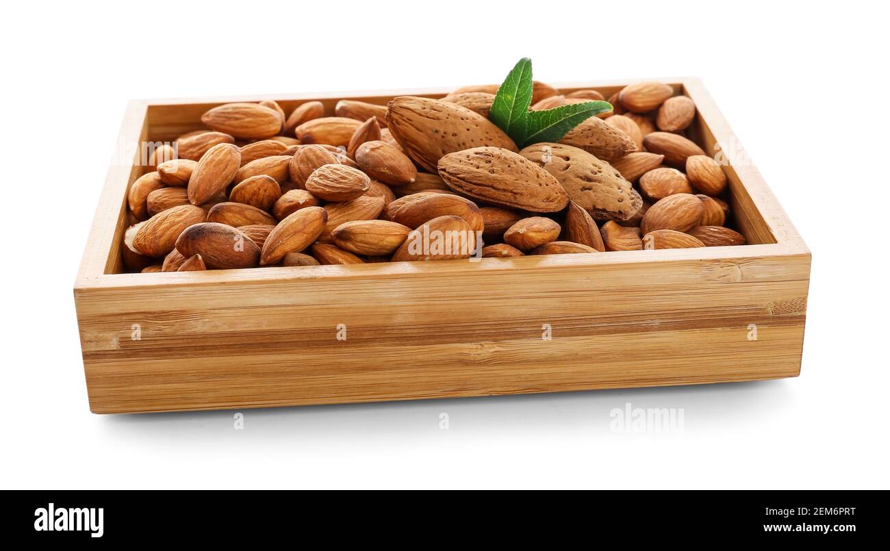 Wooden box with healthy almonds on white background Stock Photo - Alamy
