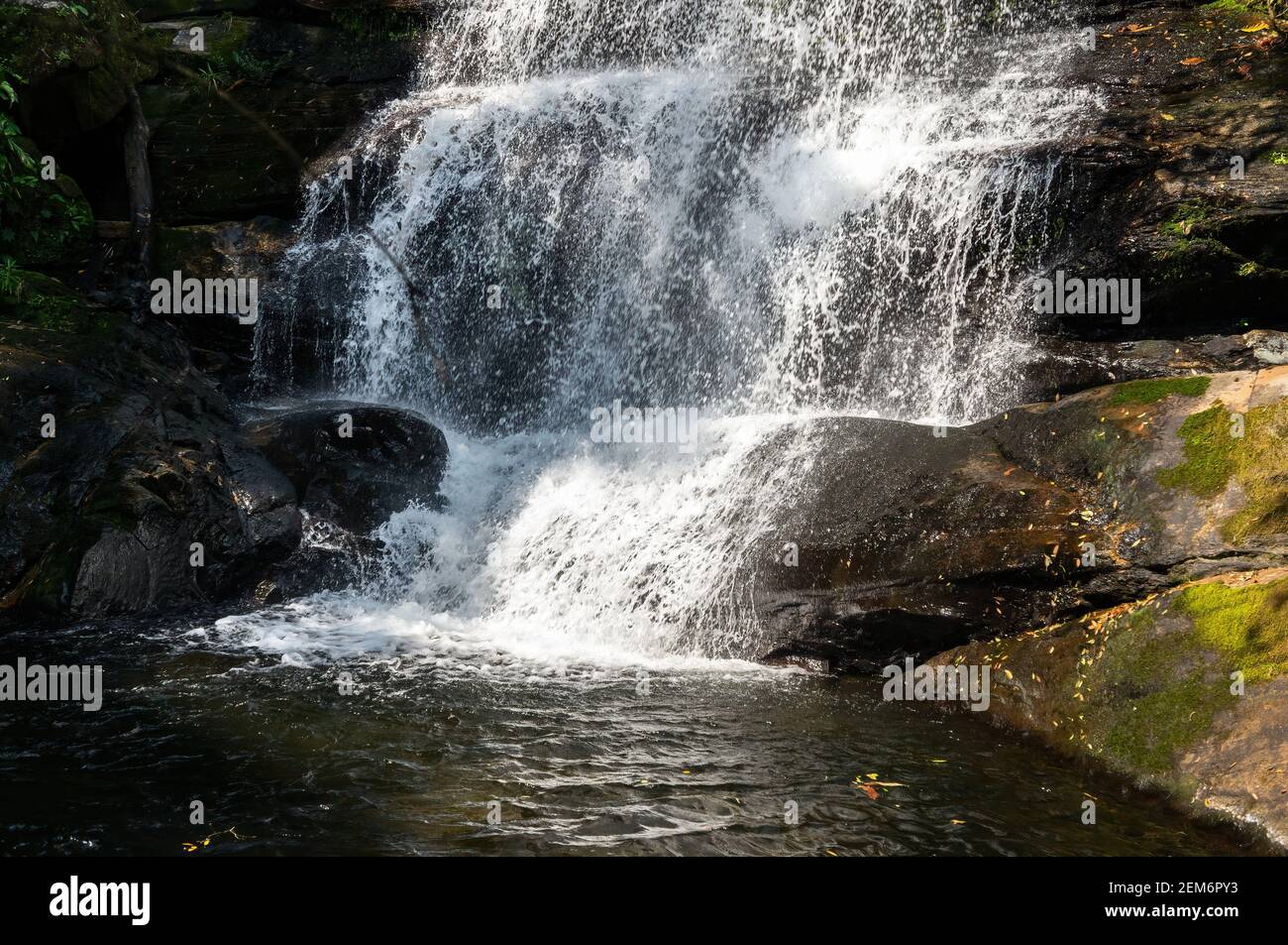 Big cascade of Ipiranguinha waterfall forming a natural pool right ...