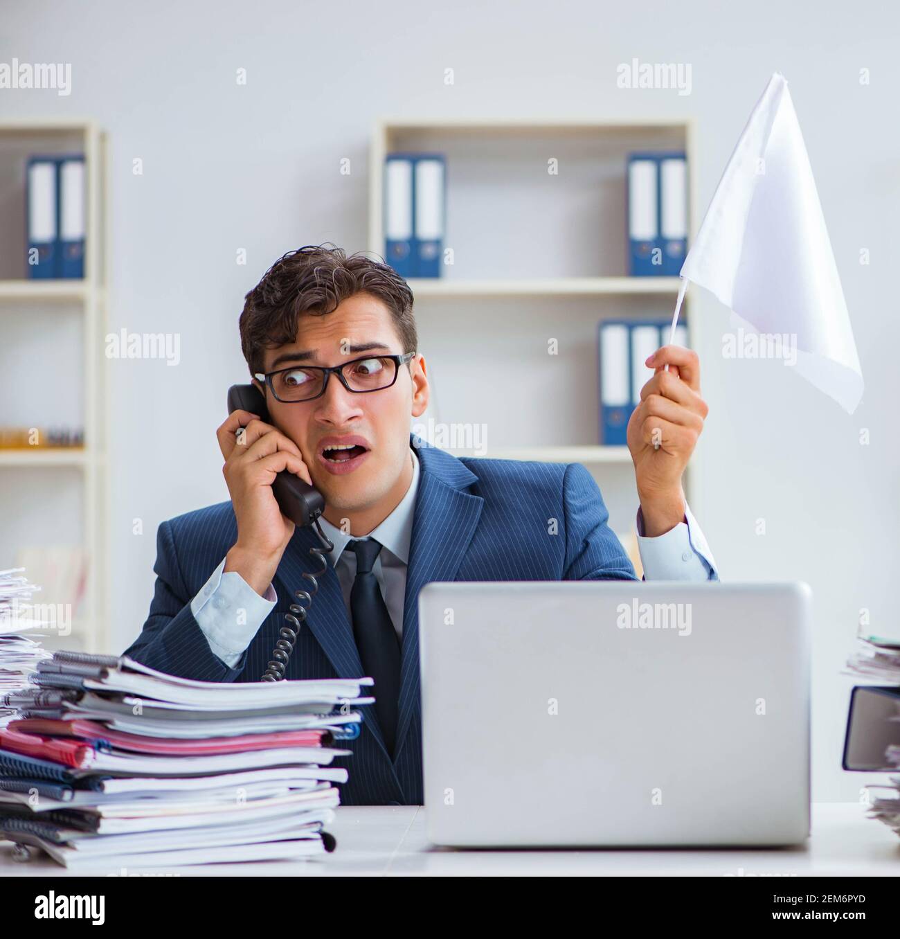 The businessman throwing white flag and giving up Stock Photo - Alamy
