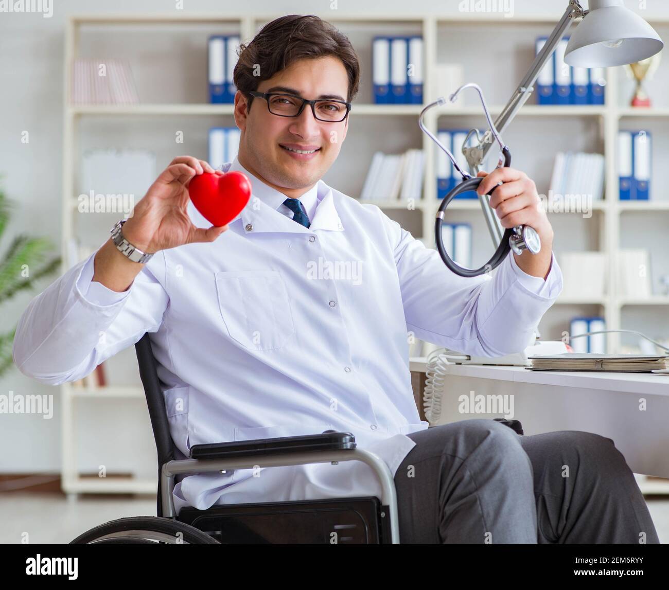 The disabled doctor on wheelchair working in hospital Stock Photo - Alamy