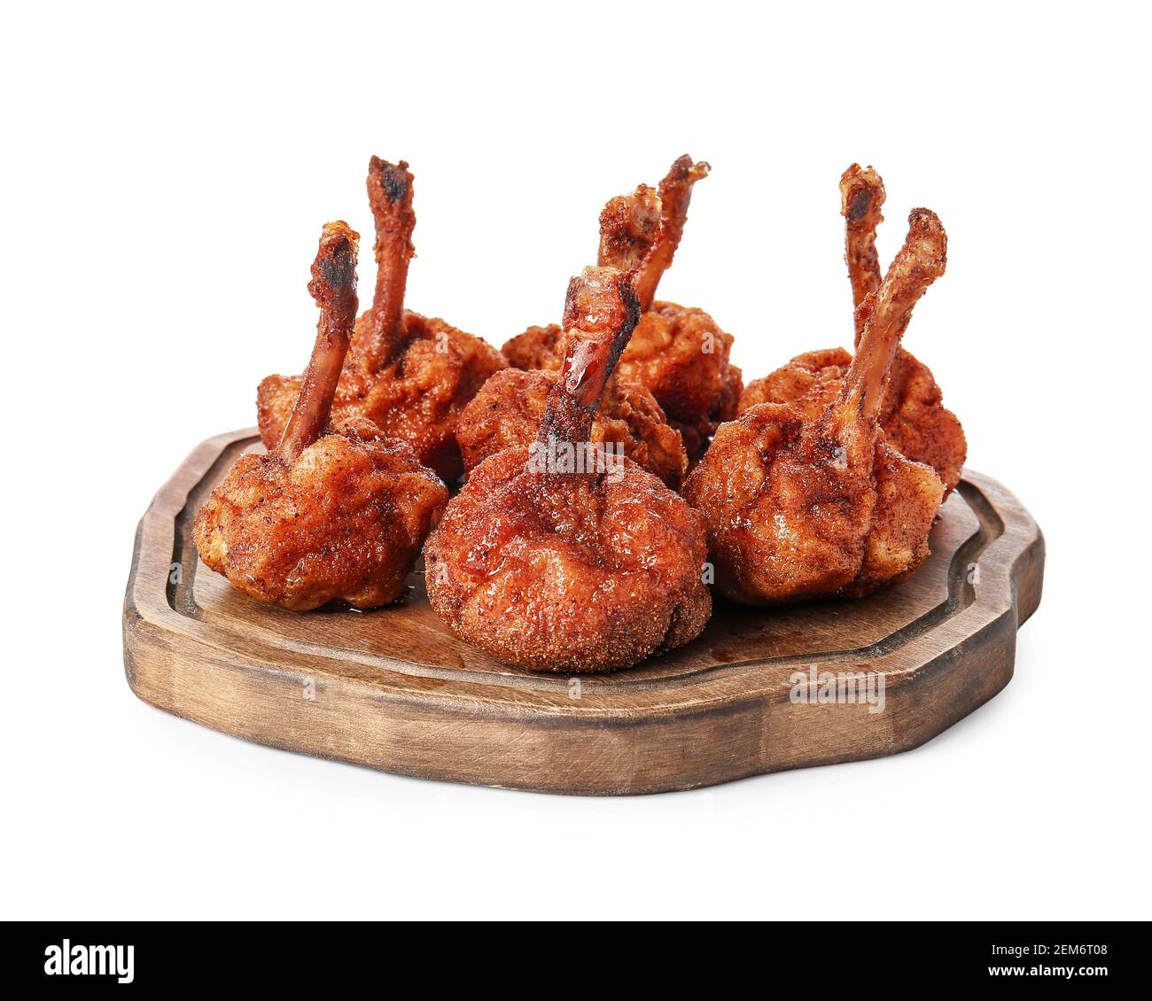 Board with tasty chicken lollipops on white background Stock Photo - Alamy