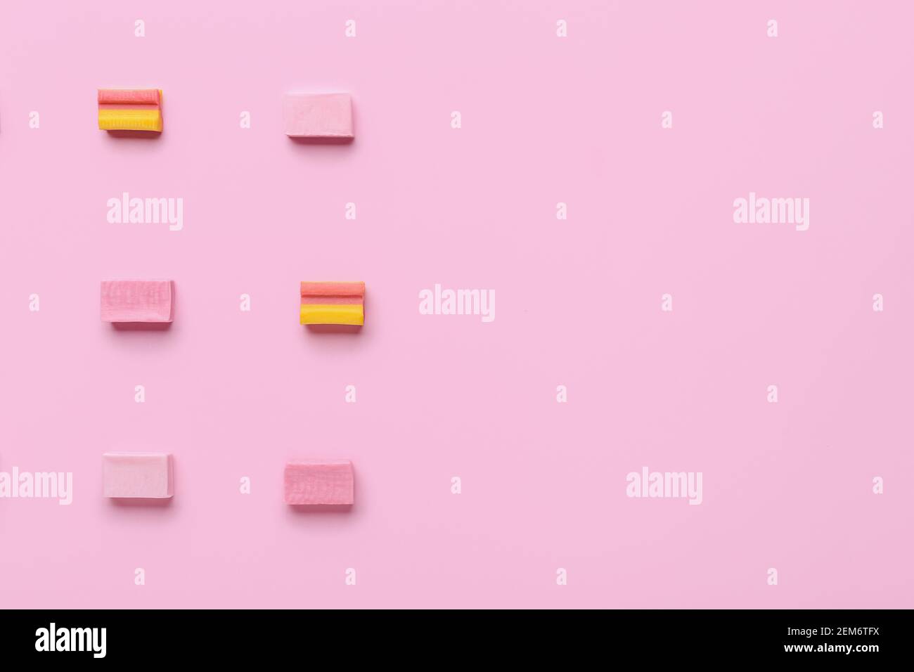 Chewing gums on color background Stock Photo - Alamy
