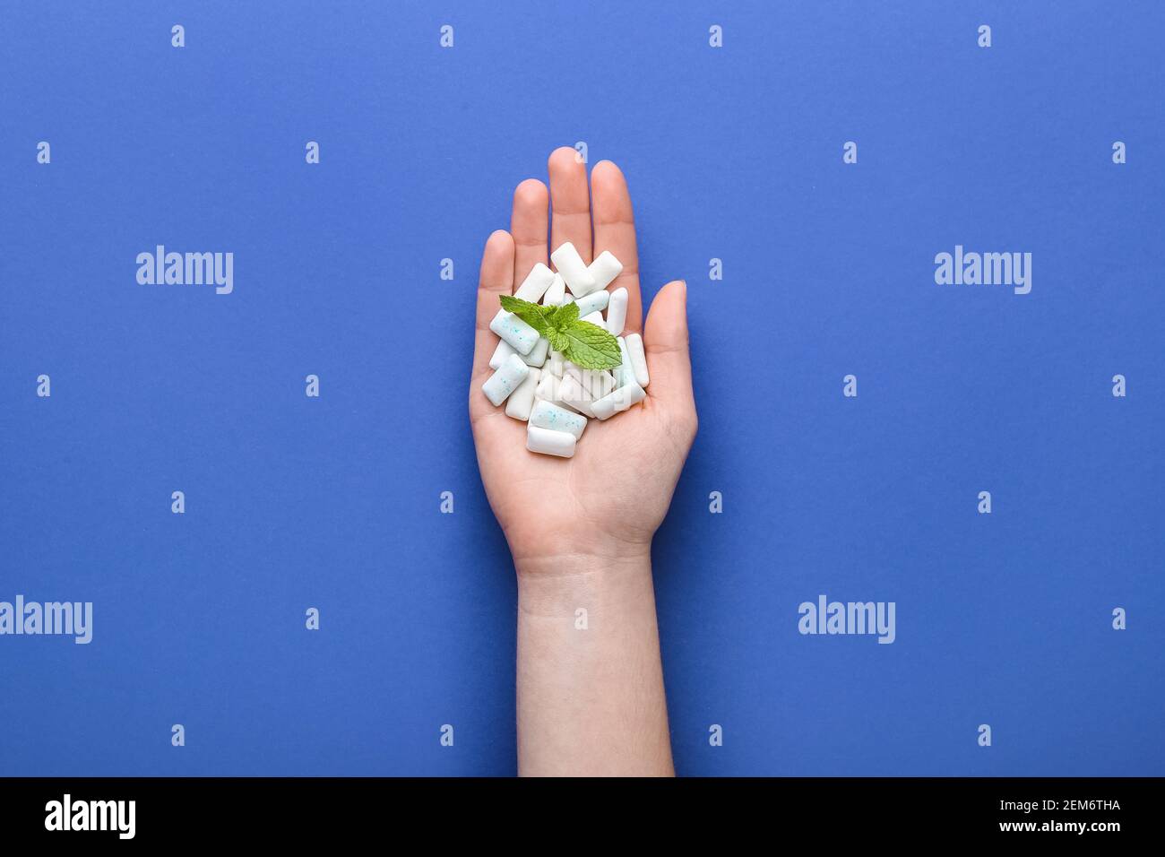 Female hand chewing gums hi-res stock photography and images - Alamy