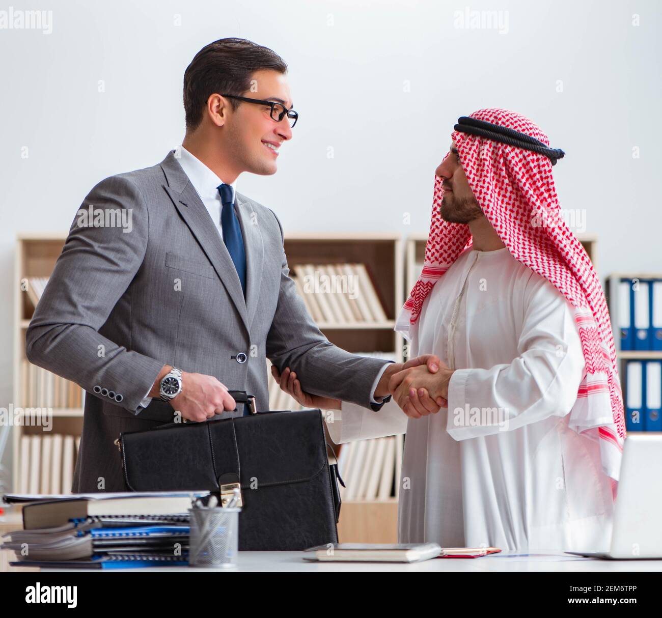 The diverse business concept with arab businessman Stock Photo - Alamy