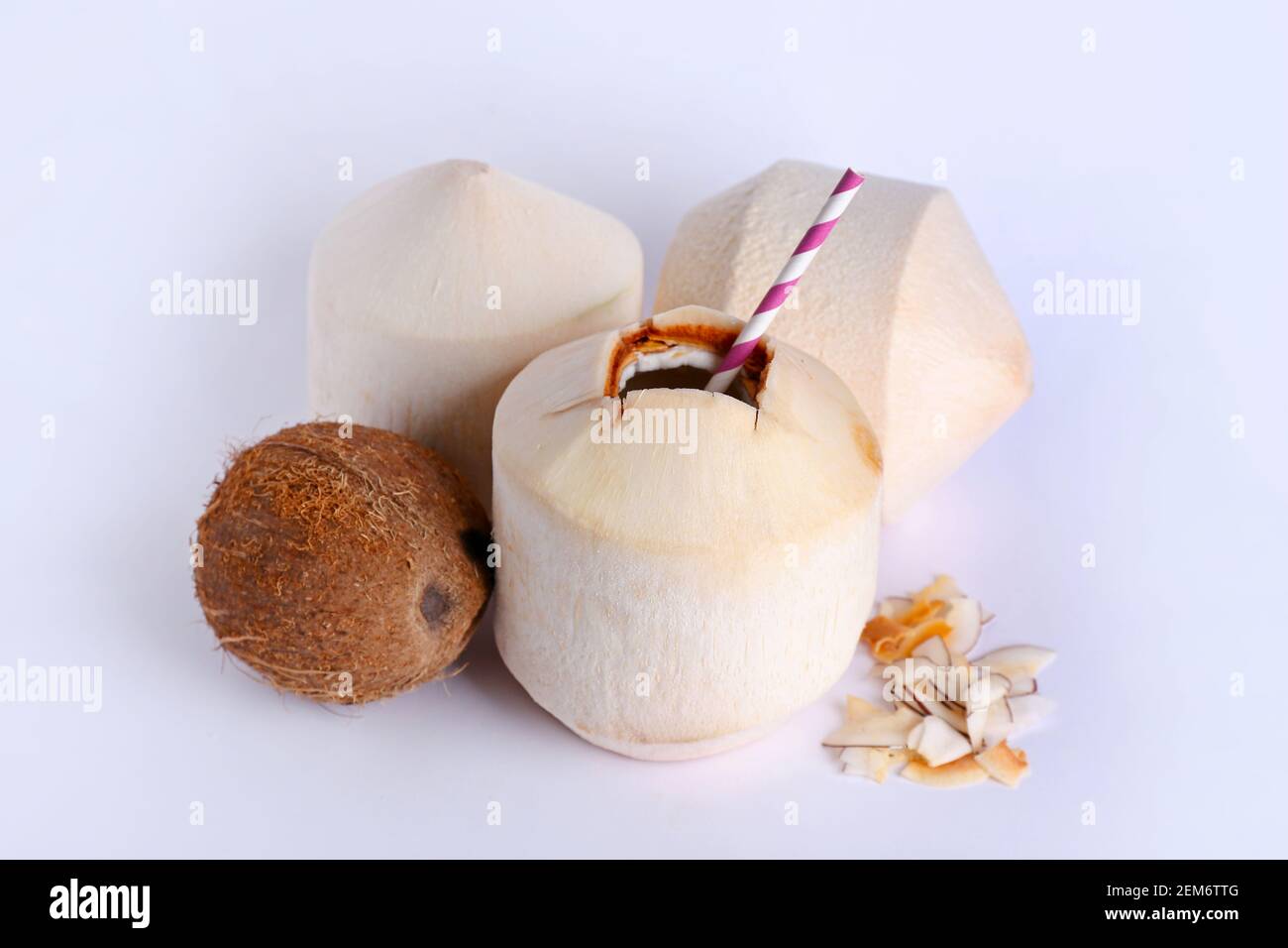 Fresh and ripe coconuts on white background Stock Photo - Alamy