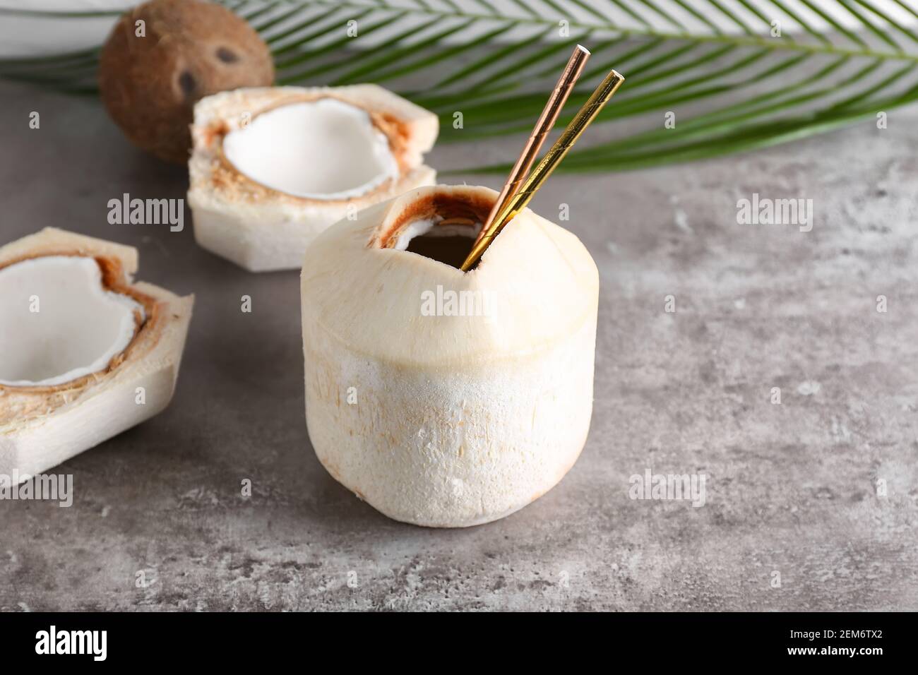 Fresh and ripe coconuts on grunge background Stock Photo - Alamy