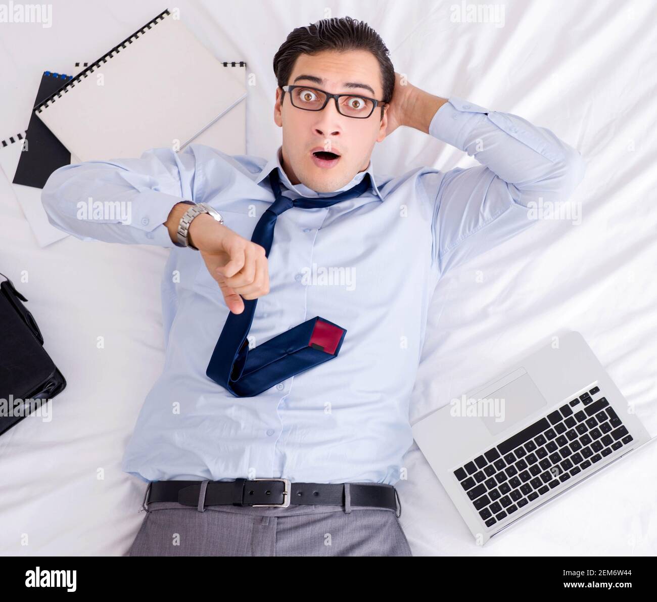 The businessman late for this flight in hotel Stock Photo - Alamy